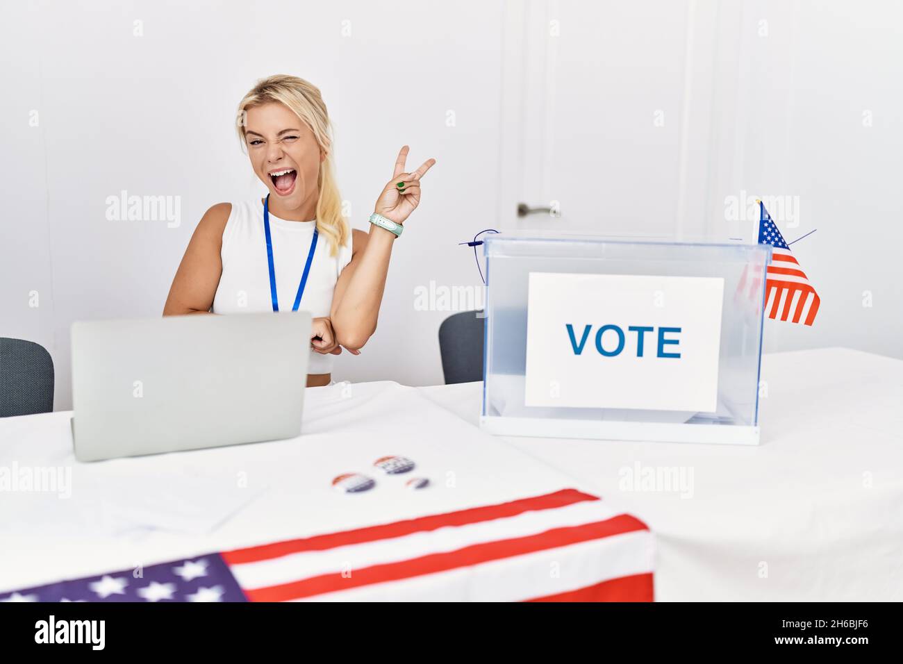 Young caucasian woman at america political campaign election smiling ...