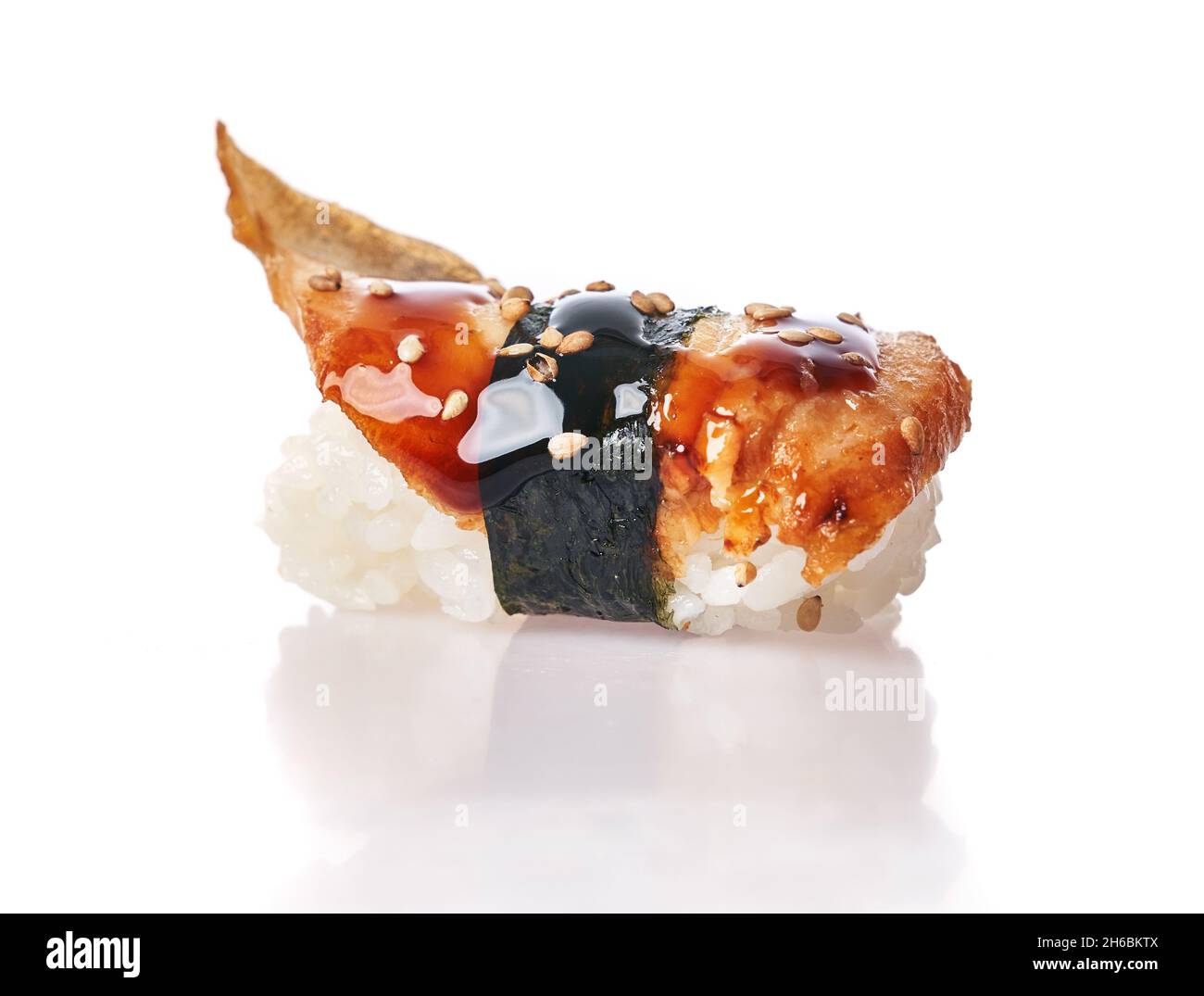 Single unagi nigiri sushi isolated on white background Stock Photo - Alamy