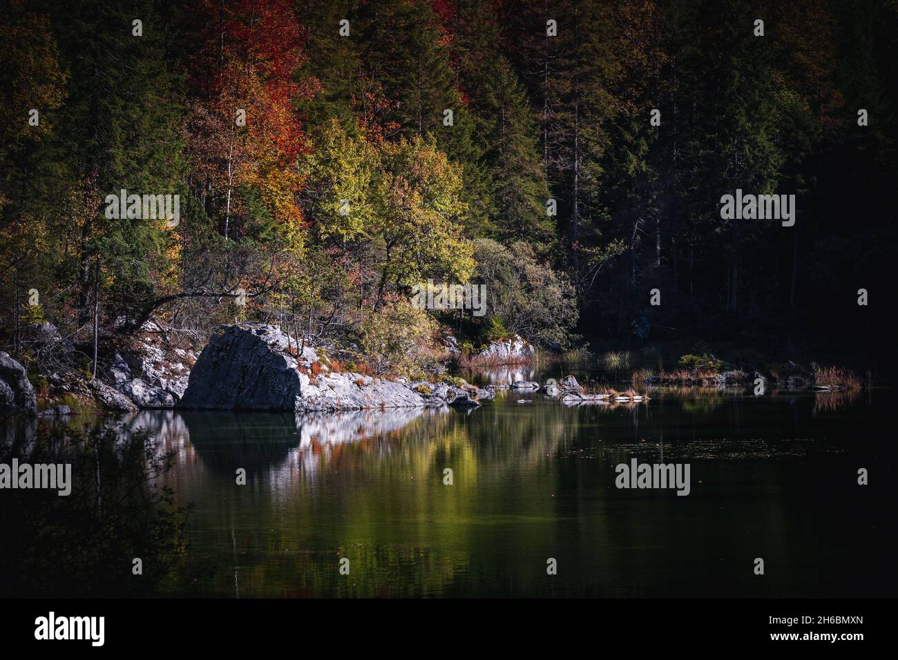 The beautiful scenery of Eibsee Lake in Bavaria, Germany during autumn ...