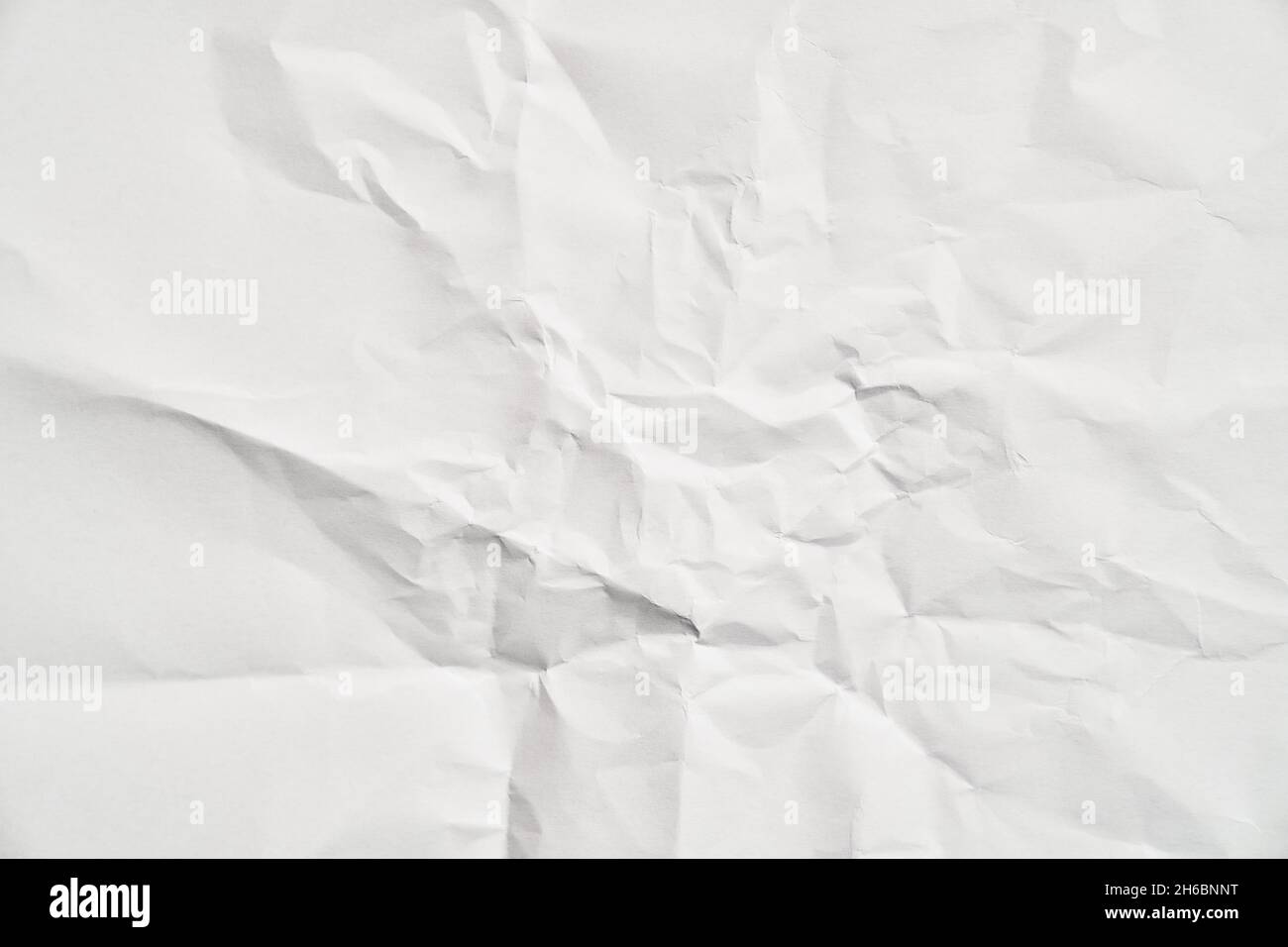 White crumpled paper texture with wrinkles. Damaged and torn sheet ...
