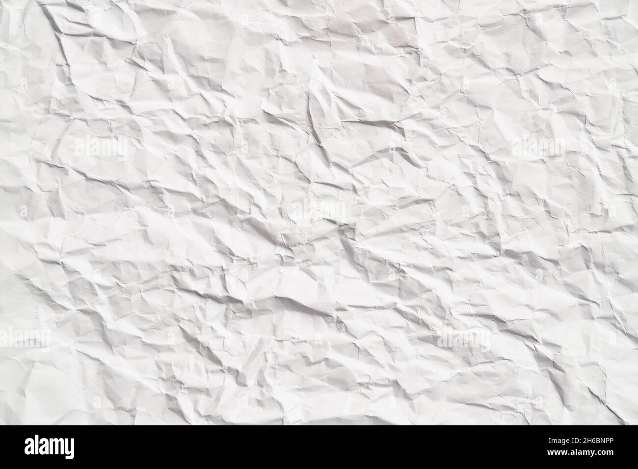 White crumpled paper texture with wrinkles. Damaged and torn sheet ...