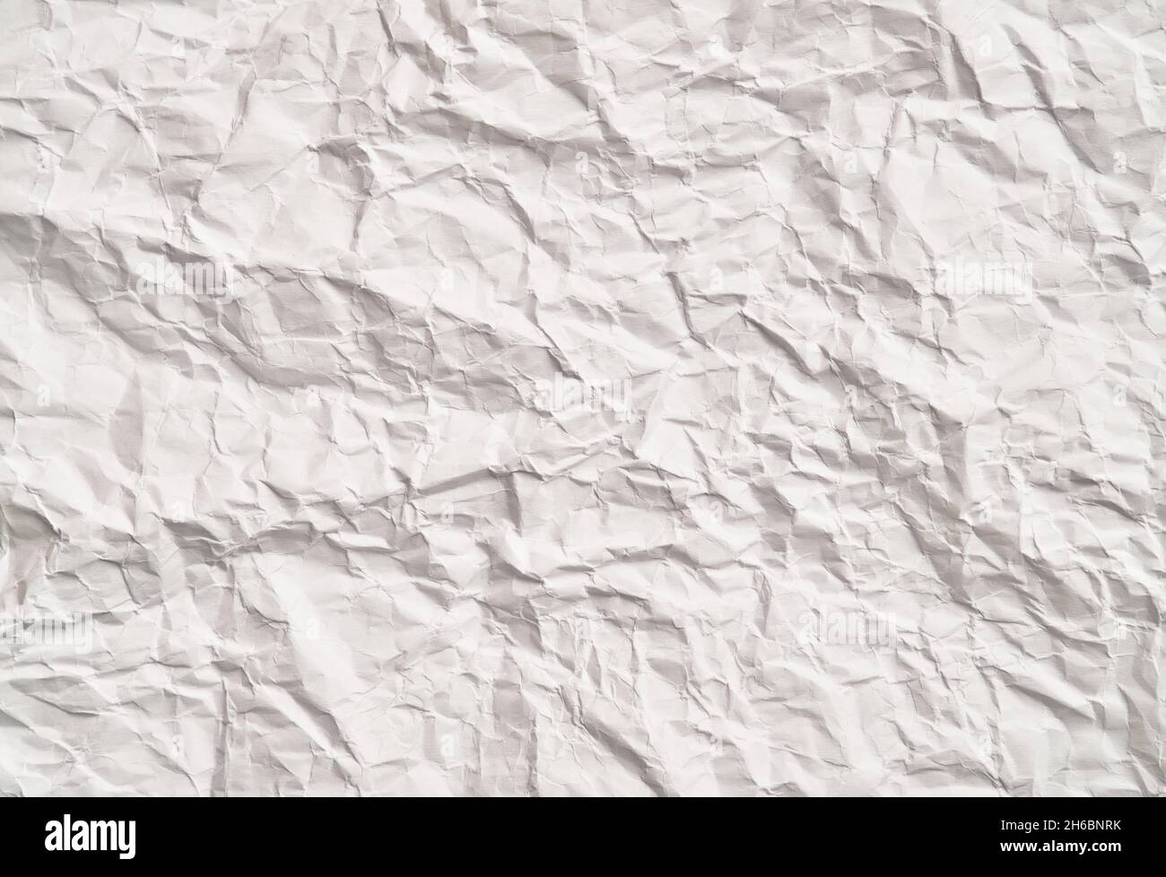 White crumpled paper texture with wrinkles. Damaged and torn sheet ...