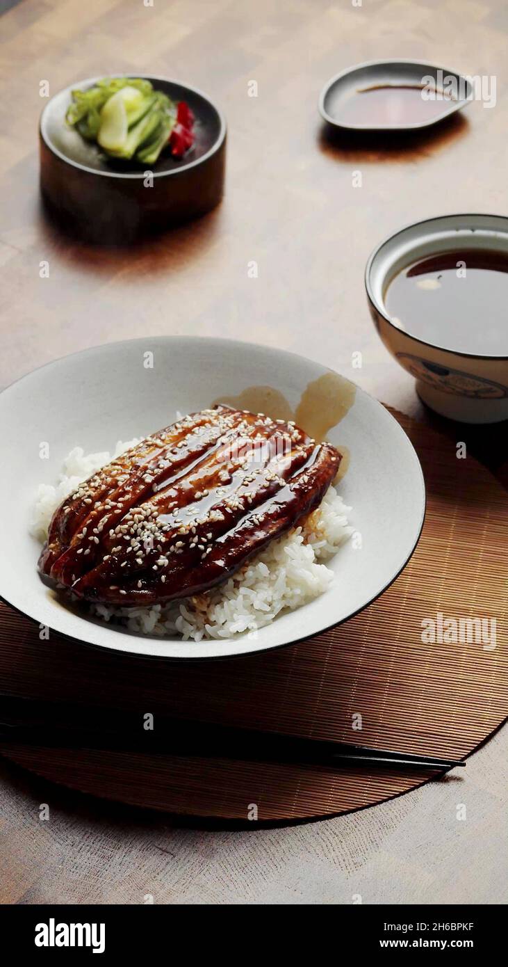 A photo of meat on rice Stock Photo - Alamy