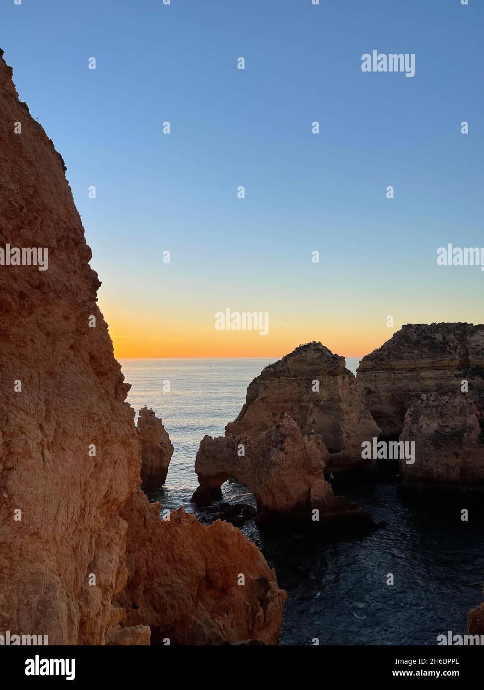 Praia Dona Ana Ponta da Piedade with turquoise sea water and cliffs ...
