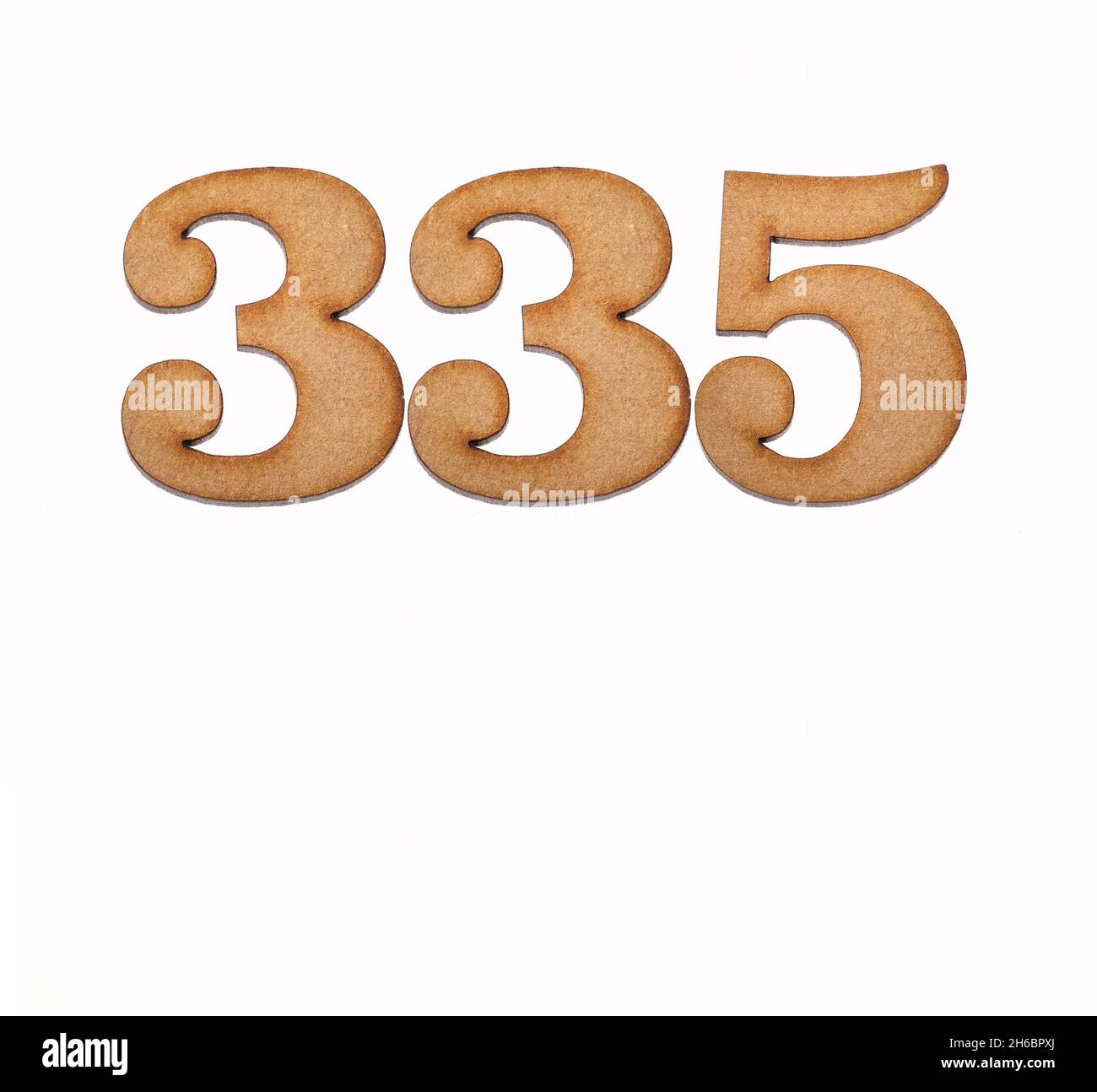 Number 335 - Piece of wood isolated on white background Stock Photo - Alamy