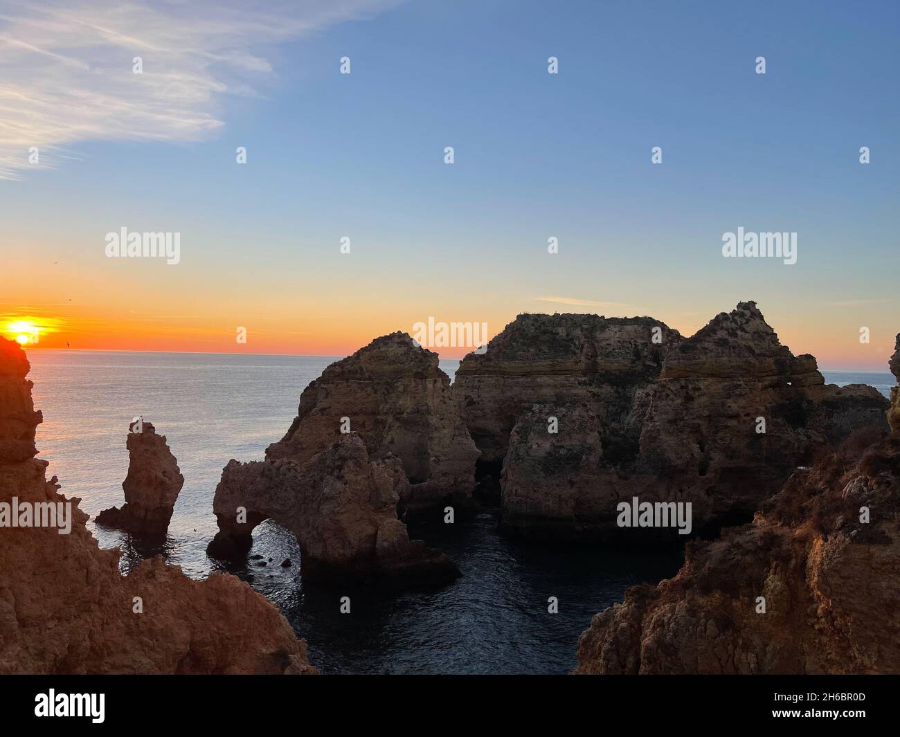 Praia Dona Ana Ponta da Piedade with turquoise sea water and cliffs ...