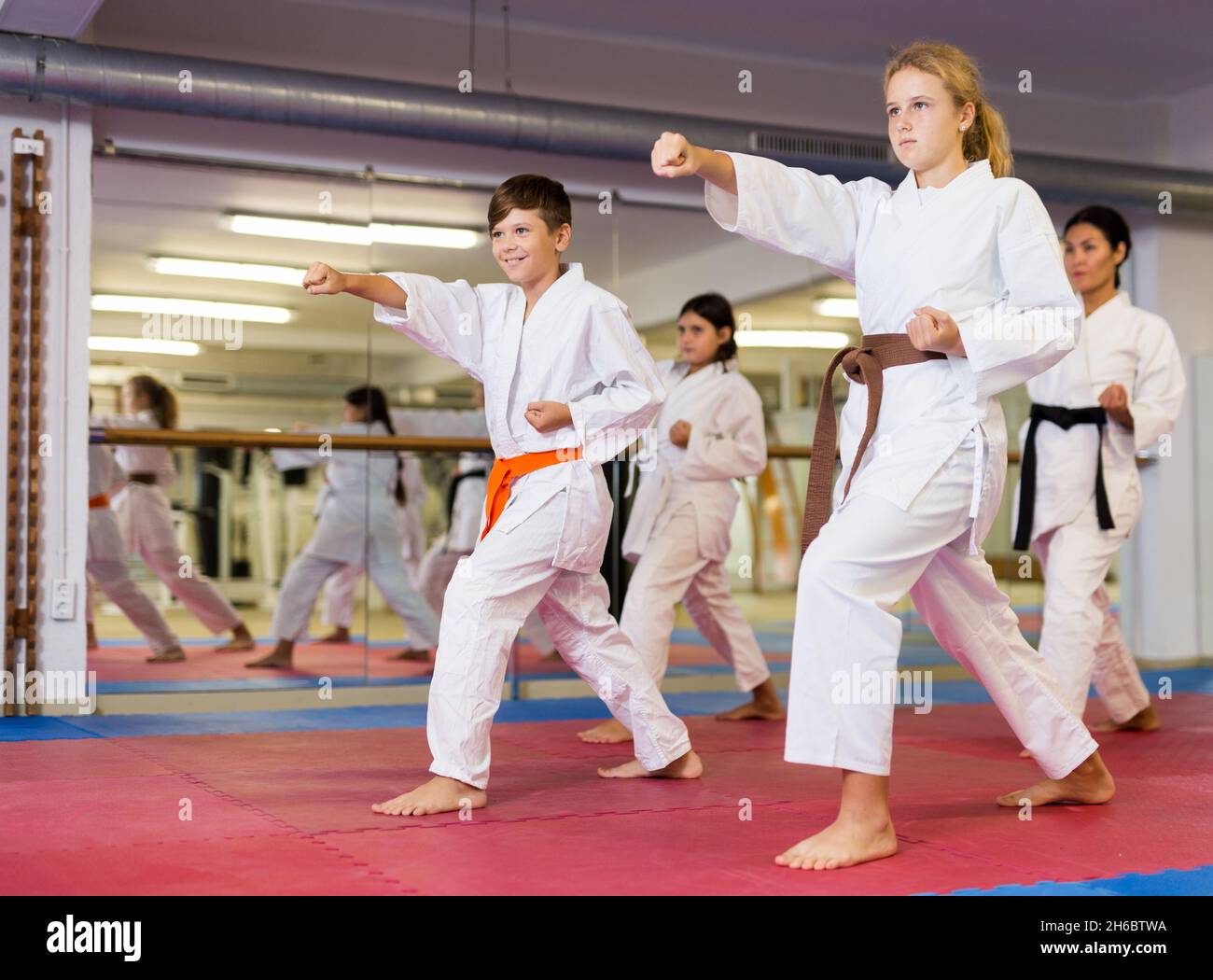 Karate kids doing kata in gym Stock Photo - Alamy