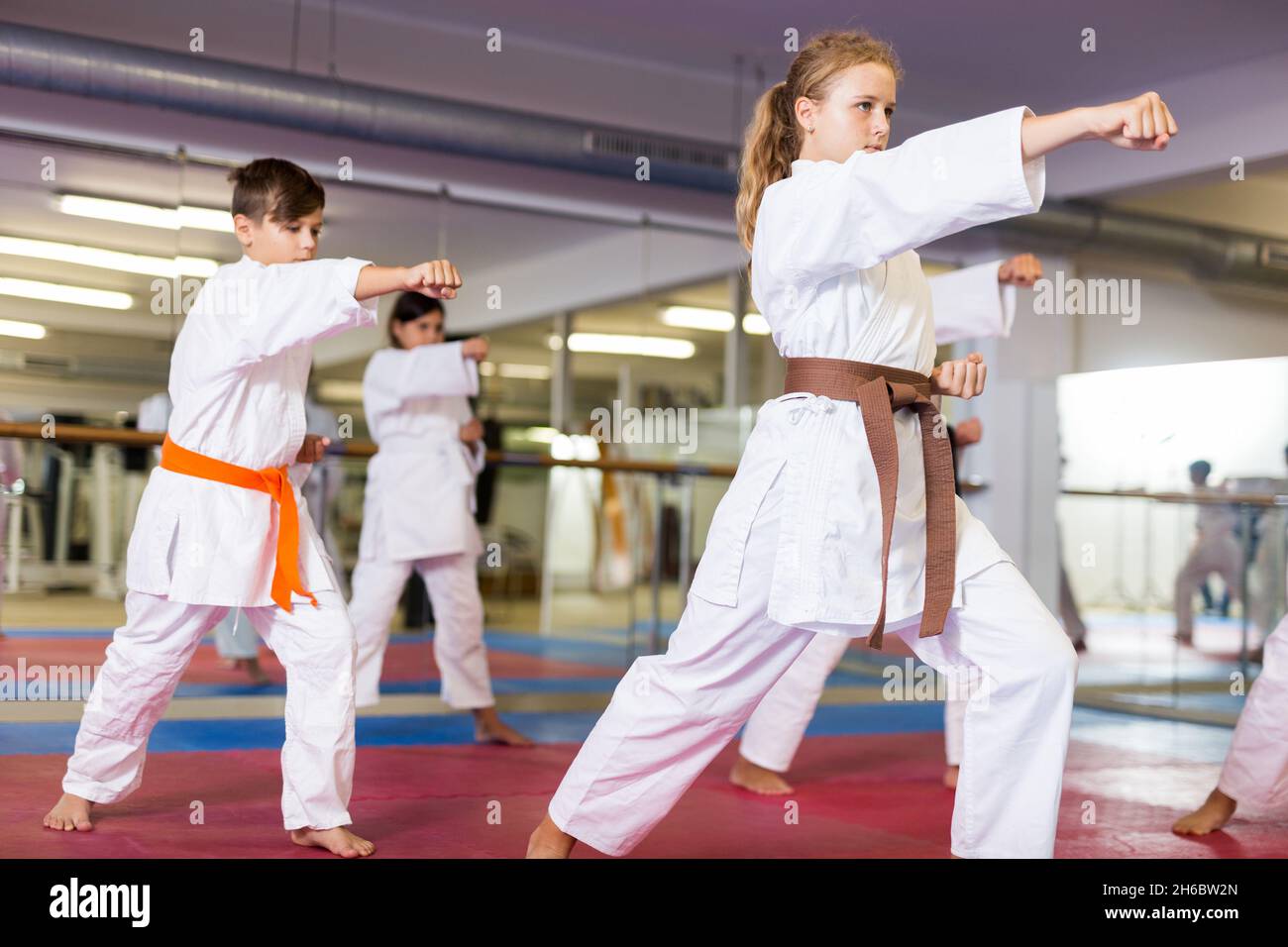 Teenager children practicing new self defense moves Stock Photo - Alamy