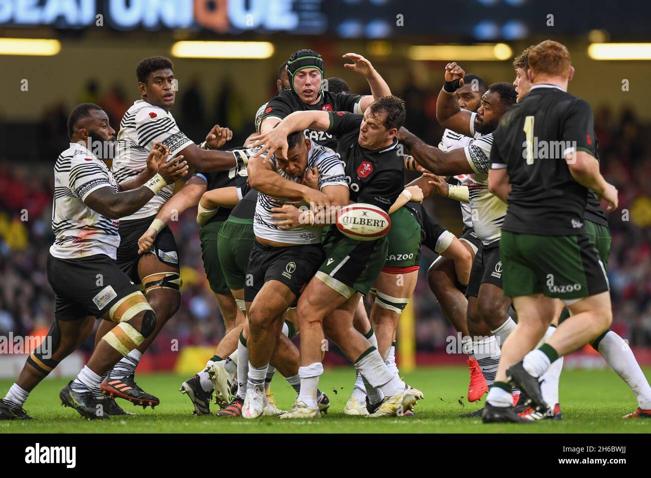 Sam Matavesi of Fiji, try to break through Wales defence Stock Photo ...