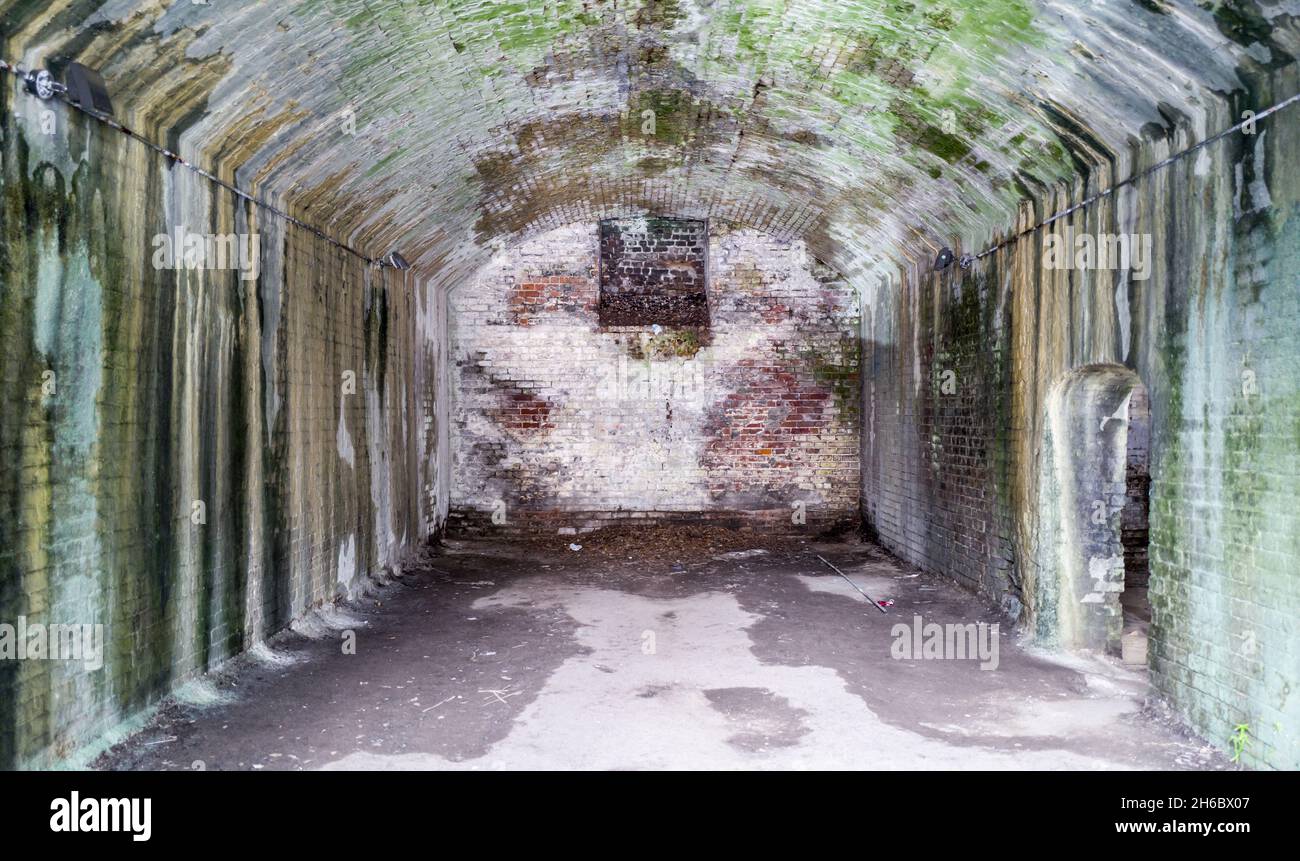 Weathered stone wall inside historic storage bunker Stock Photo - Alamy