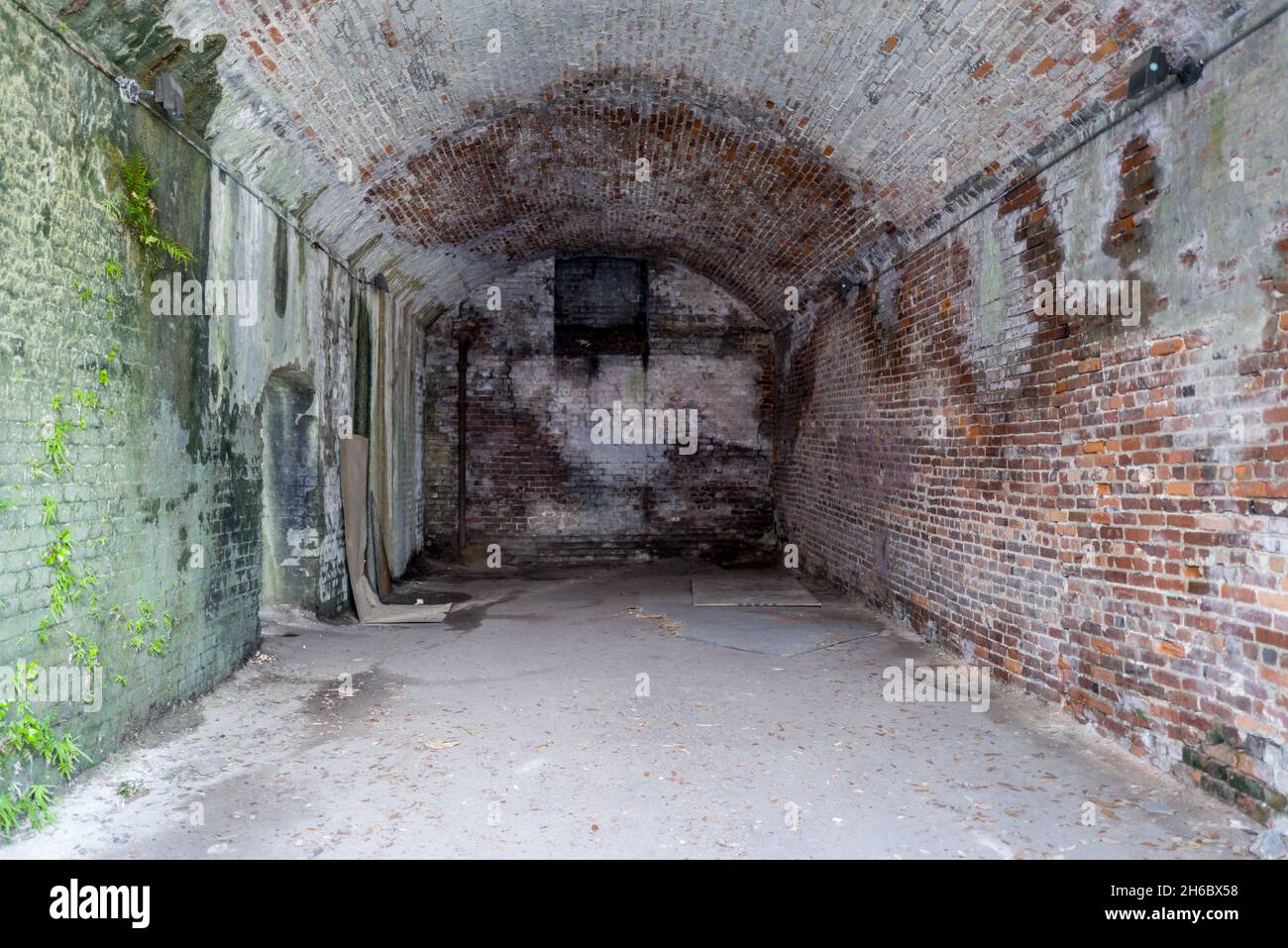 Weathered stone wall inside historic storage bunker Stock Photo - Alamy