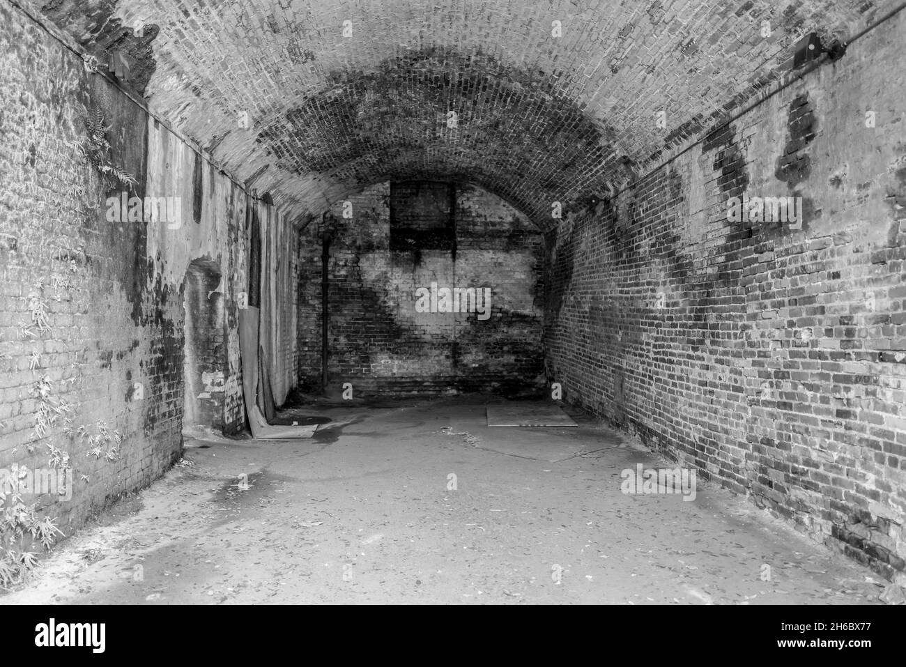Weathered stone wall inside historic storage bunker Stock Photo - Alamy