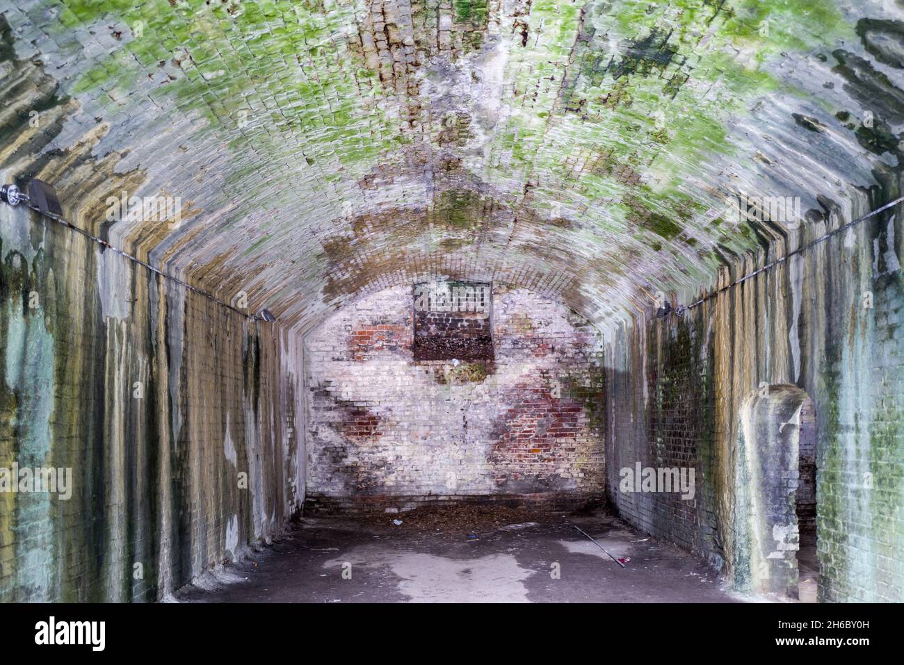 Weathered stone wall inside historic storage bunker Stock Photo - Alamy