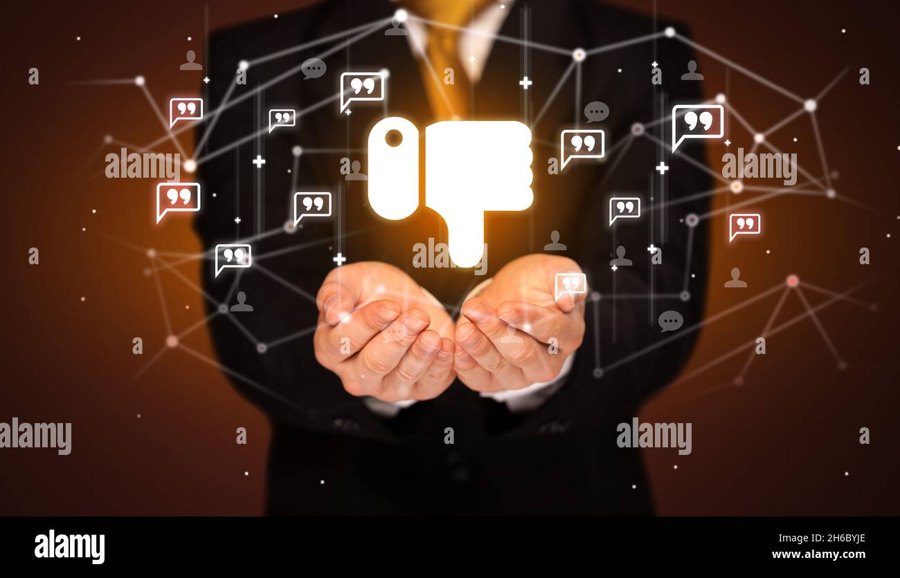 Hand holding social media icons Stock Photo - Alamy