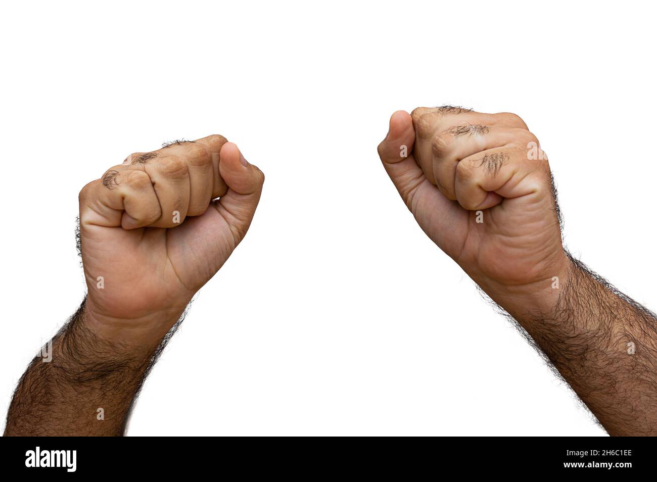 Male hairy hands and arms with closed hands pointing up isolated on ...