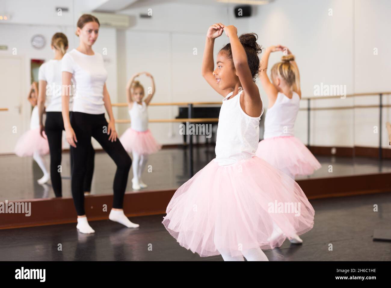 Two girls practicing choreographic elements Stock Photo - Alamy