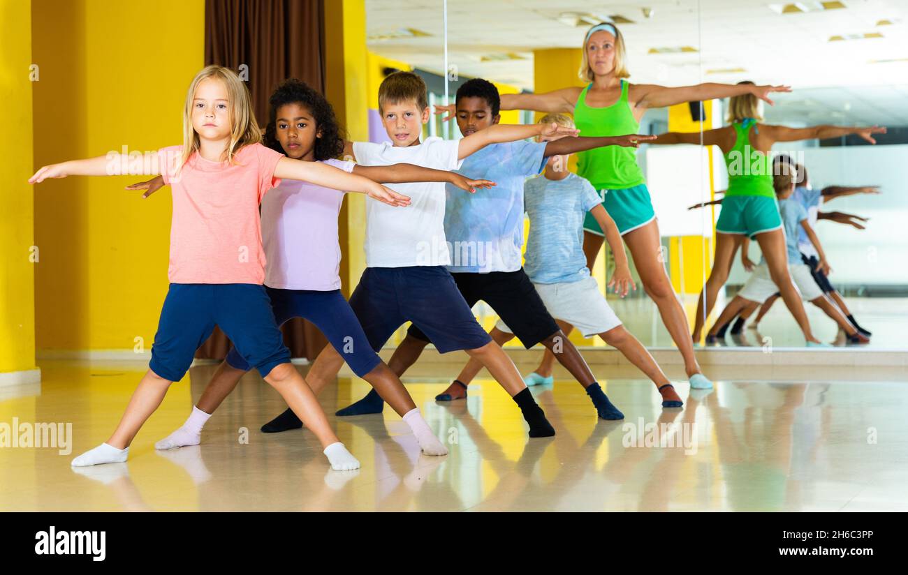 Children dancing in classroom hi-res stock photography and images - Alamy
