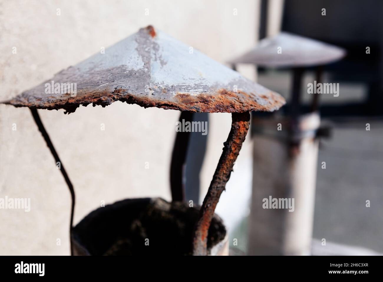 Ventilation tube on the rooftop . Old and rusty ventilation system ...