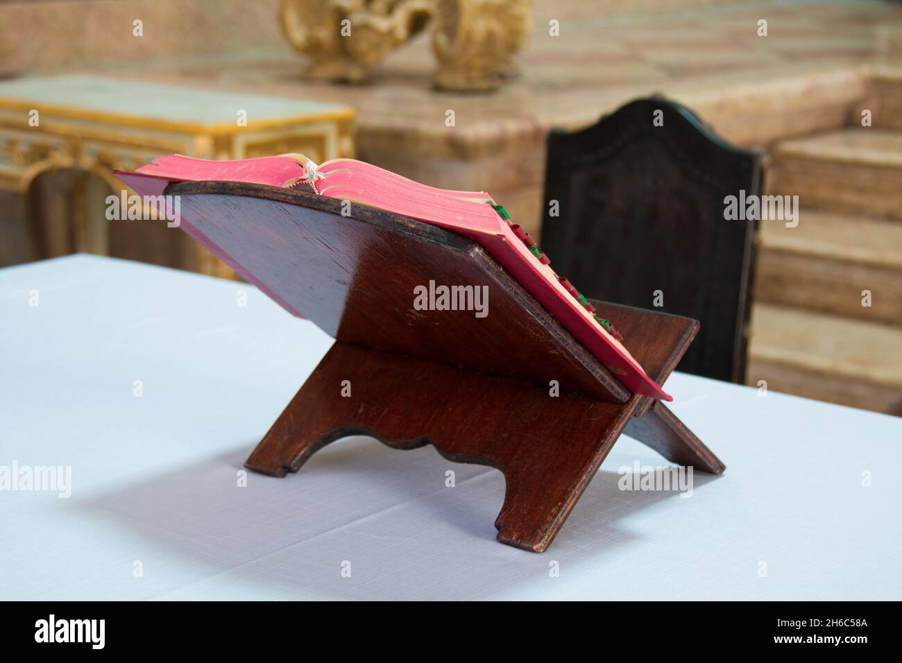 Bible open on the church altar Stock Photo - Alamy