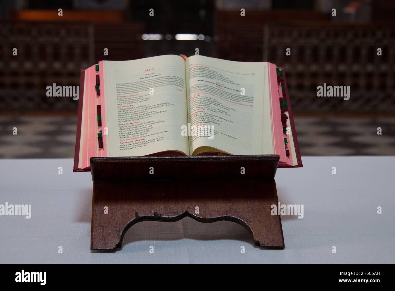 Bible open on the church altar Stock Photo - Alamy