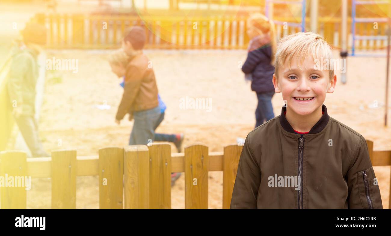 Happy boy on playground Stock Photo - Alamy