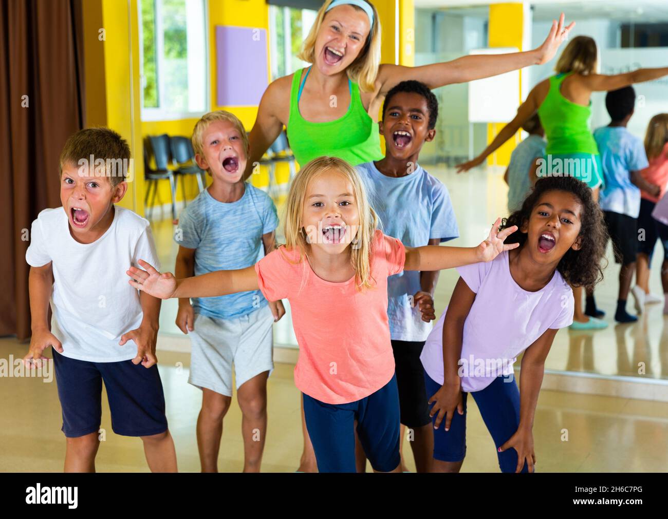 Positive children in dance studio smiling and having fun Stock Photo ...