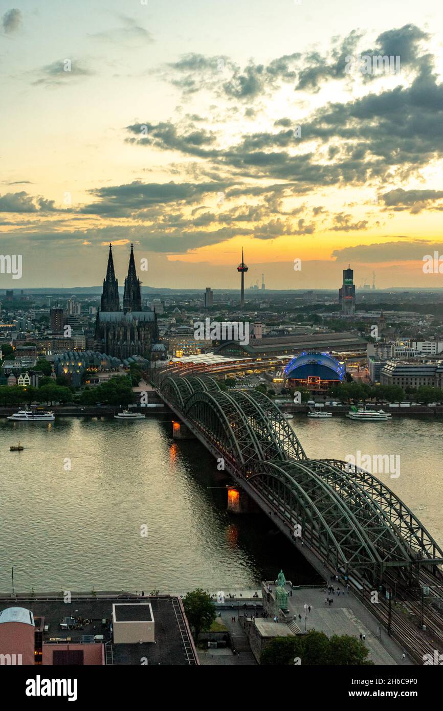 Beautiful view of a bridge on a river and the cityscape of Cologne ...