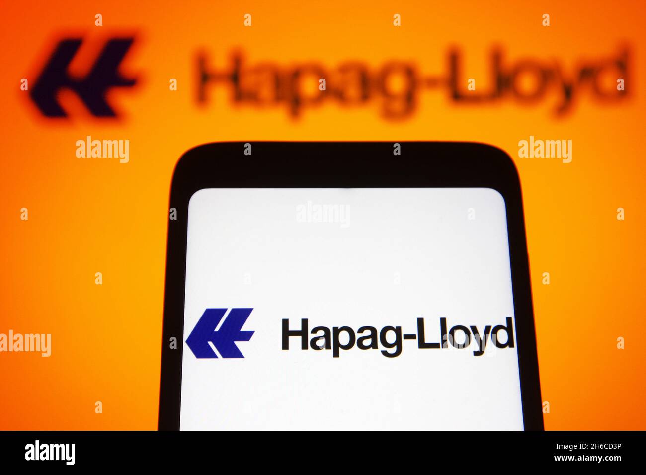 In this photo illustration, a Hapag-Lloyd AG logo is seen on a ...