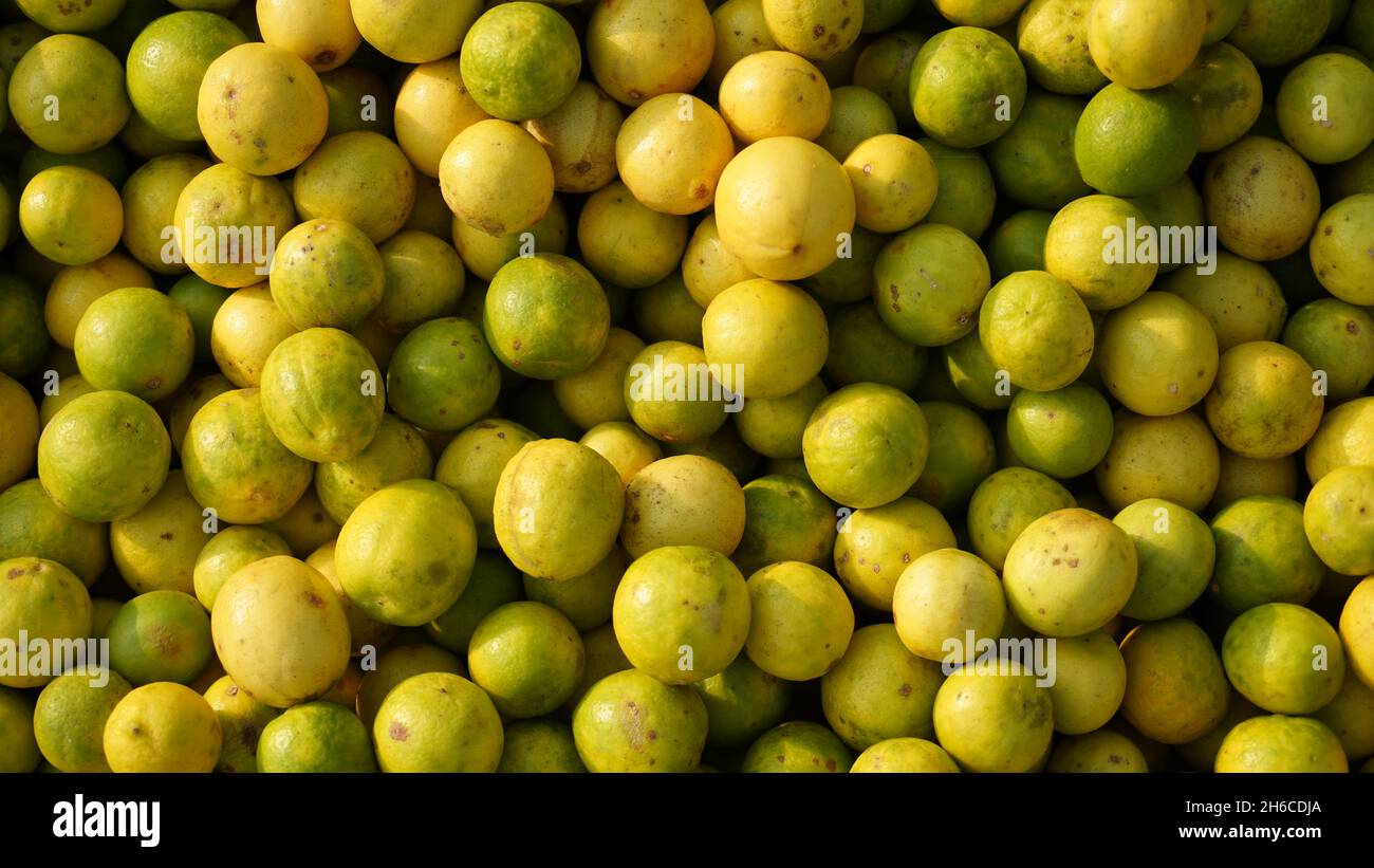 High-Resolution Image: Fresh Lemons at a Vibrant Vegetable Market Stock ...