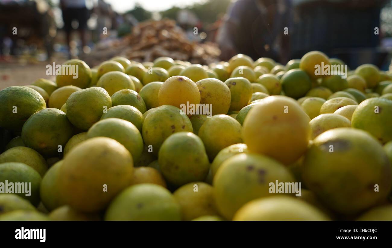 High-Resolution Image: Fresh Lemons at a Vibrant Vegetable Market Stock ...