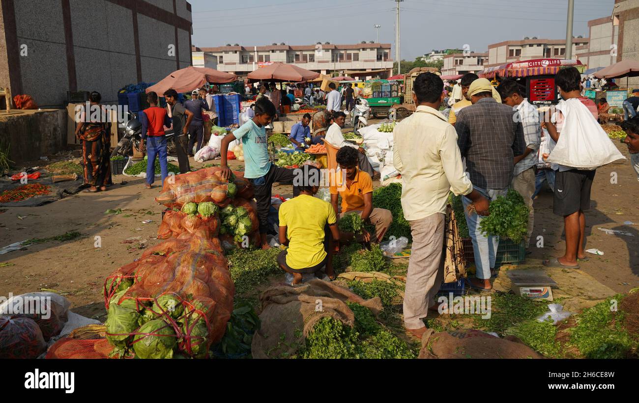 Picking the perfect seasonal produce at the local Noida market. # ...