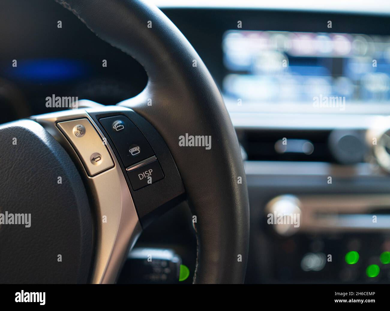 control buttons on the steering wheel close up Stock Photo - Alamy