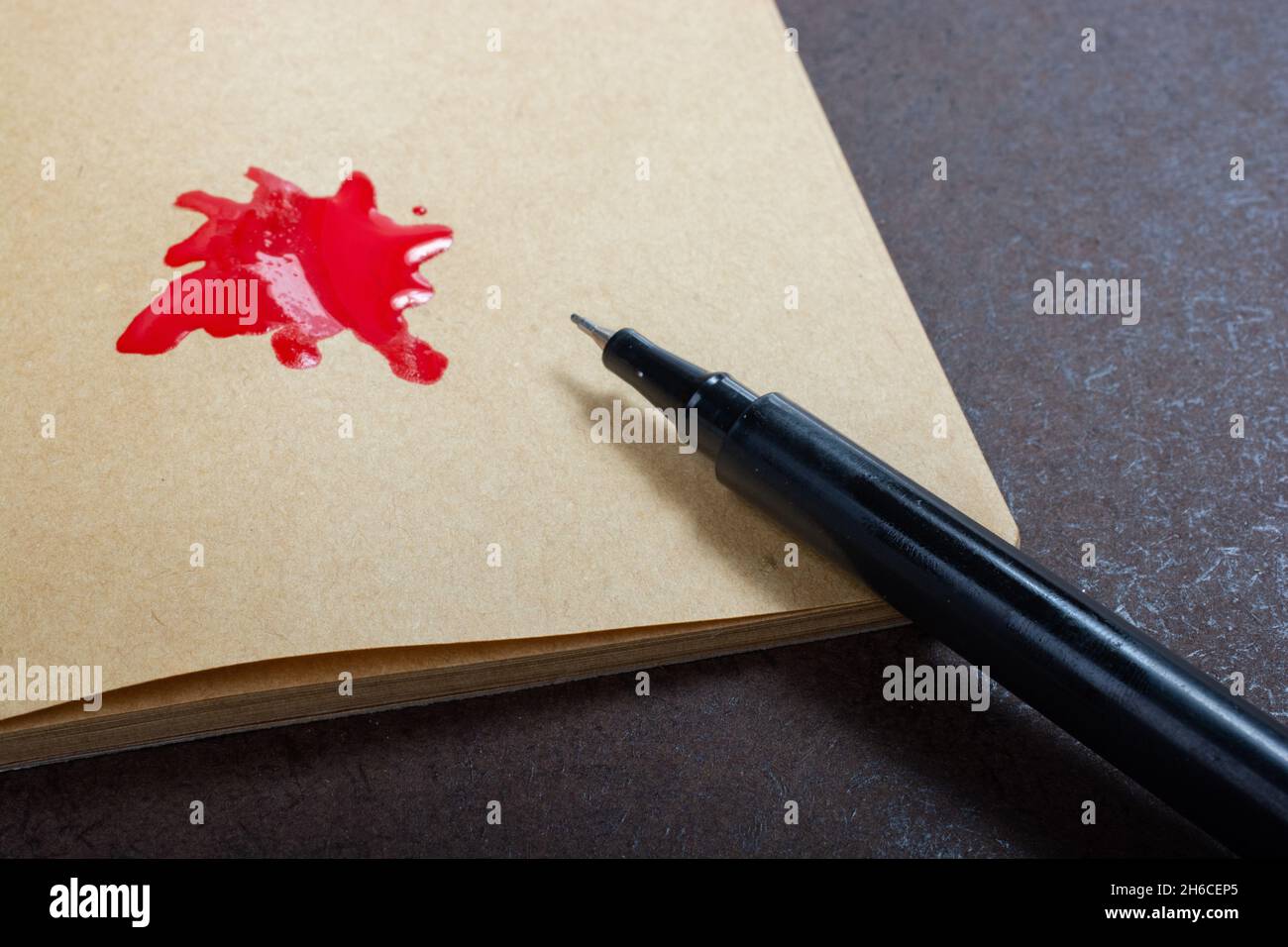 Blood splatter painted on yellow paper Stock Photo - Alamy