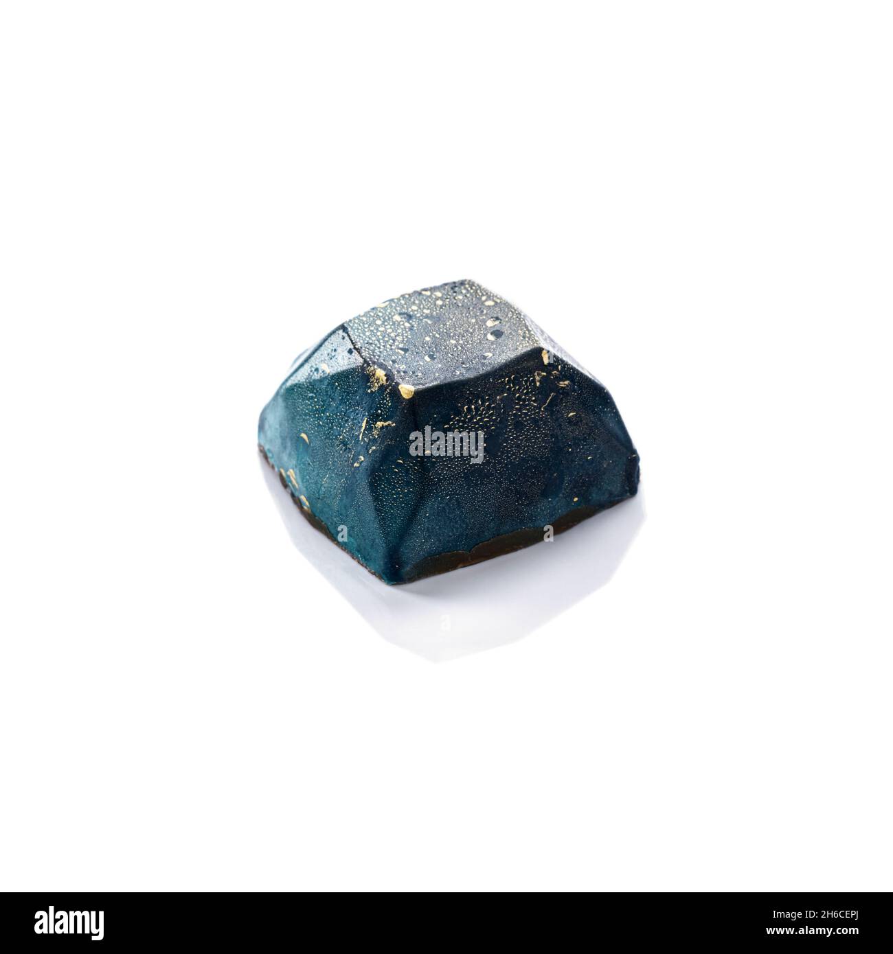 Handmade blue color chocolate candy isolated on white background. Front ...