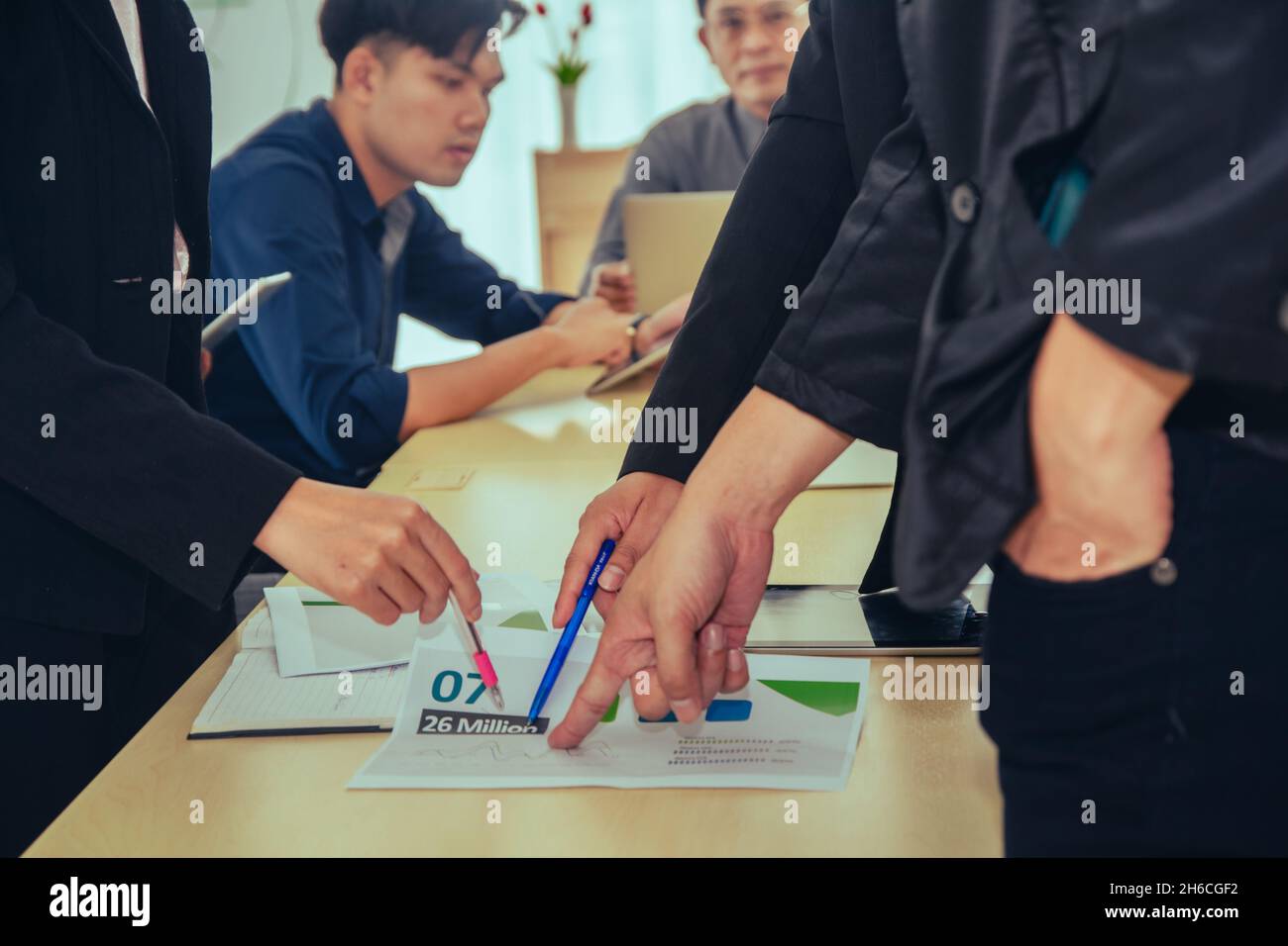 Teamwork business meeting business report in office Stock Photo - Alamy