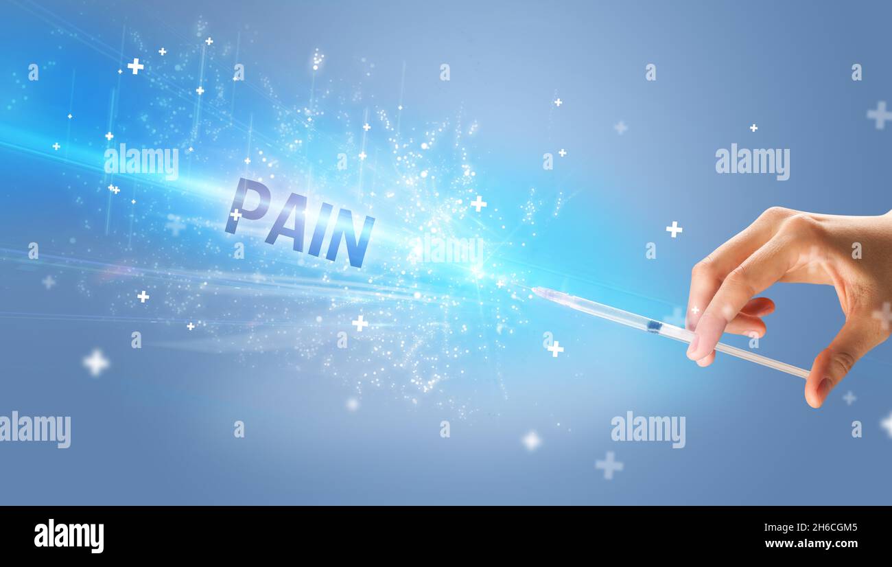 Syringe, medical injection in hand Stock Photo - Alamy