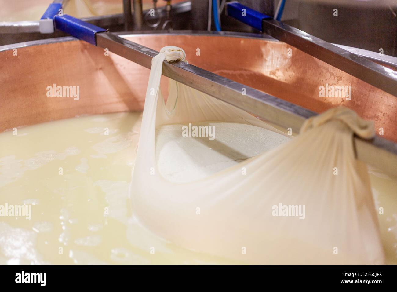Parmesan Rarmigiano Reggiano italian cheese manufacturing at dairy farm ...