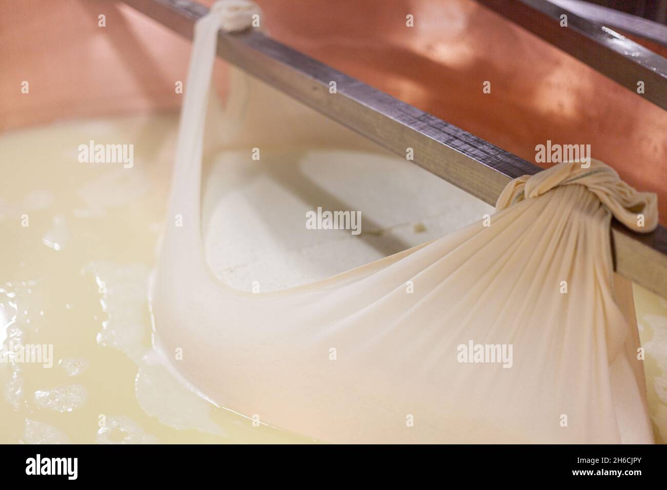 Parmesan Rarmigiano Reggiano italian cheese manufacturing at dairy farm ...