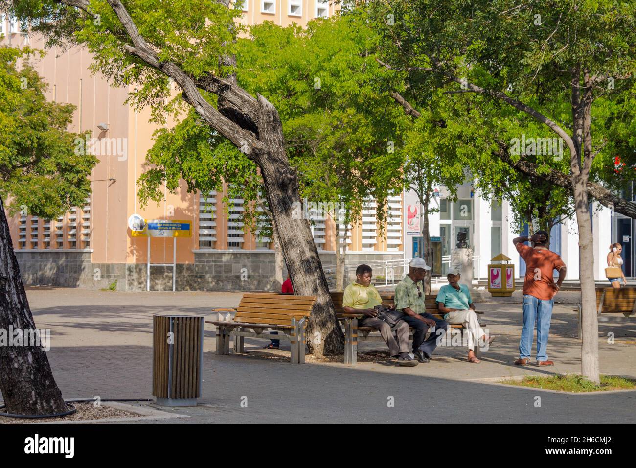 Seniors chatting in a square in Willemstad, Curacao Stock Photo - Alamy