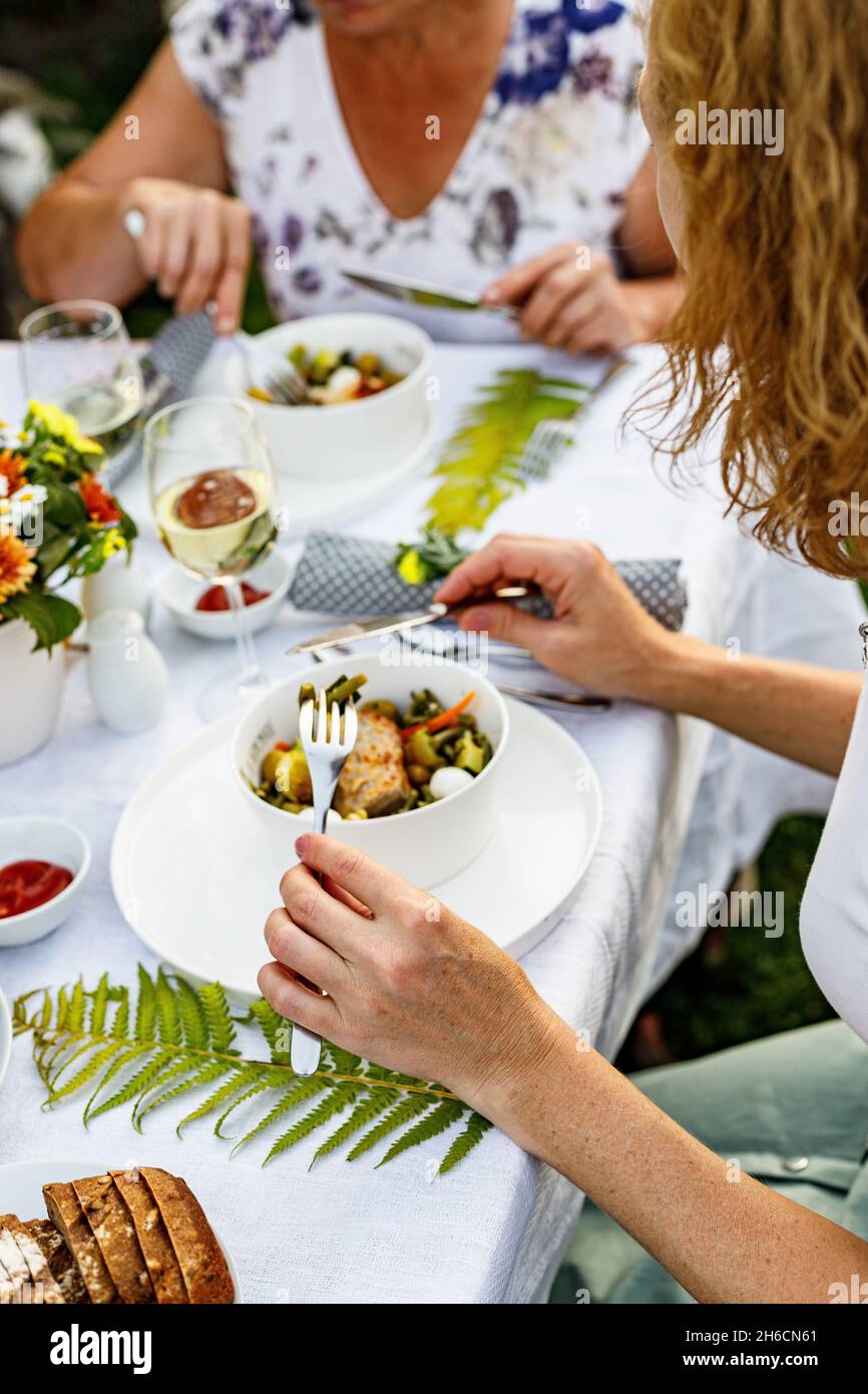Family celebrations and food concept. The family is having dinner at a ...