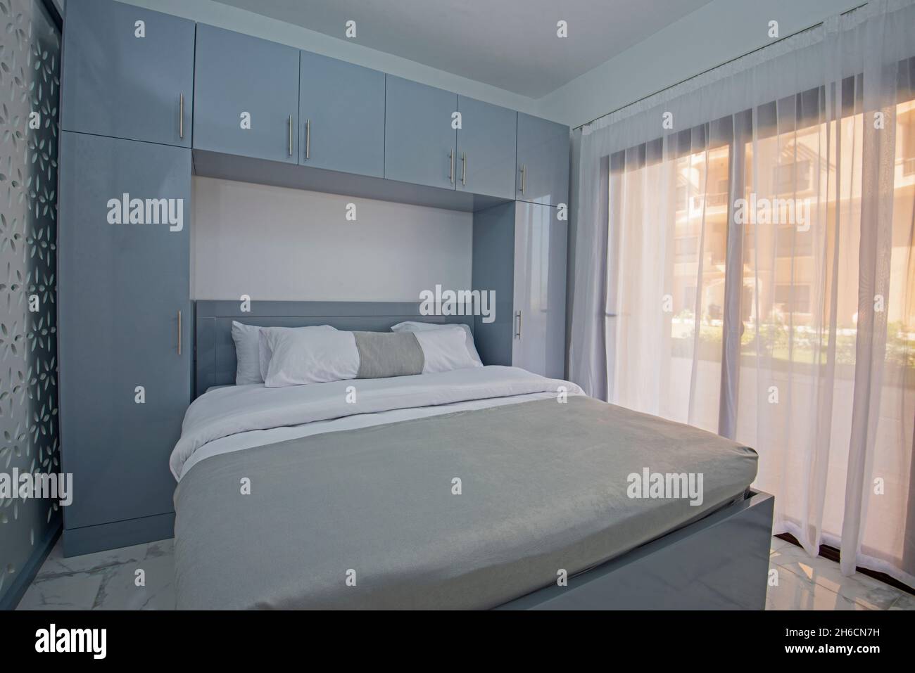 Interior design decor furnishing of luxury show home bedroom showing ...