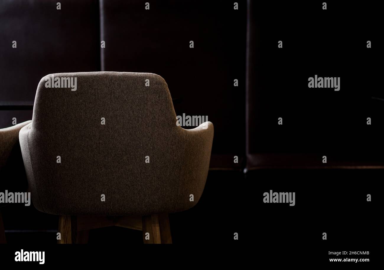 minimalistic dark interior of a cafe with an armchair Stock Photo - Alamy