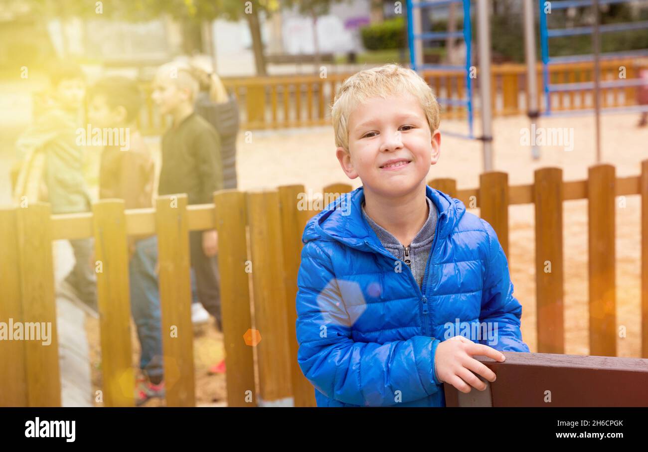 Happy boy on playground Stock Photo - Alamy