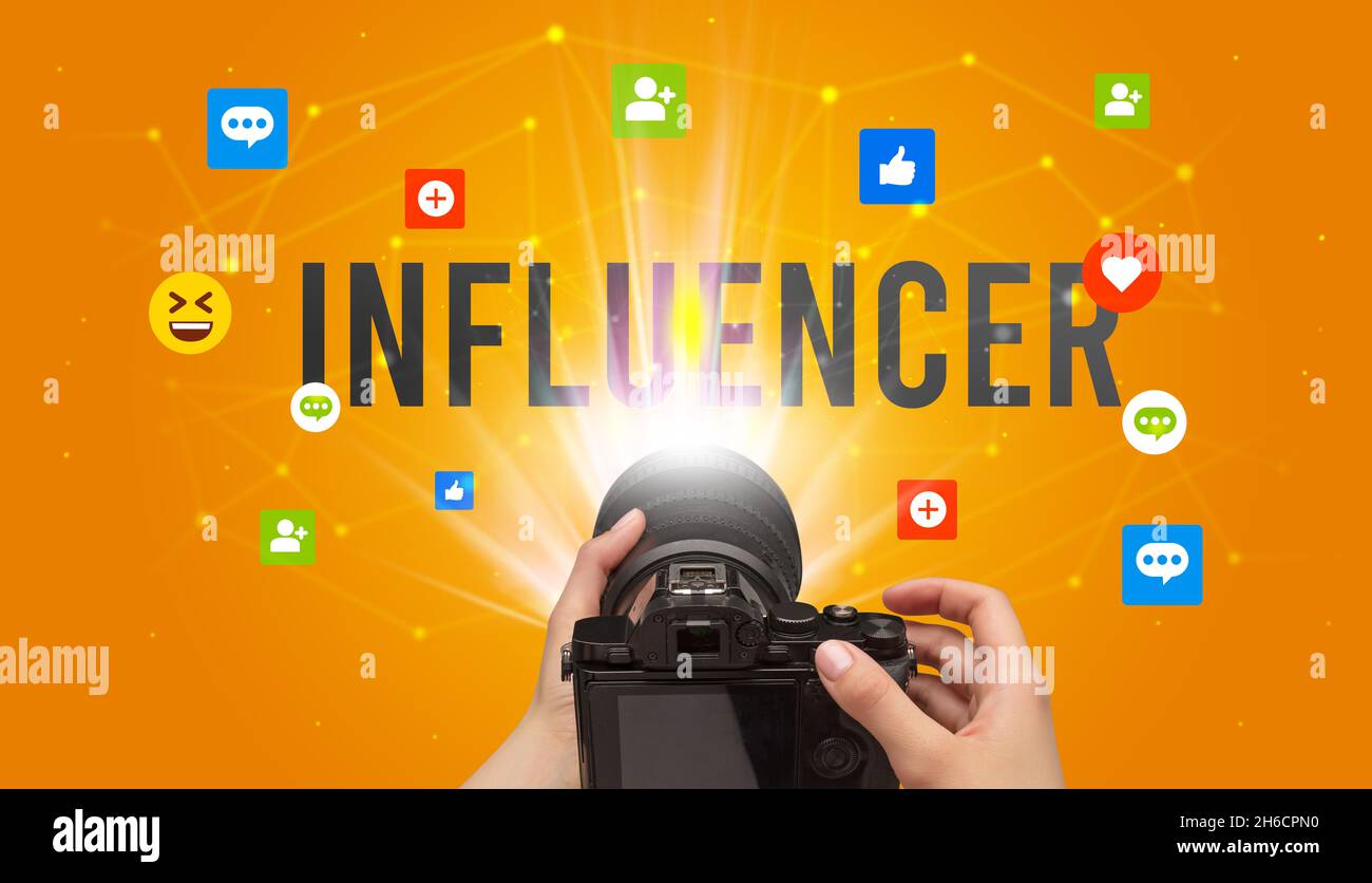 Using camera to capture social media content Stock Photo - Alamy