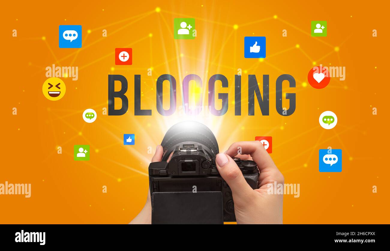 Using camera to capture social media content Stock Photo - Alamy