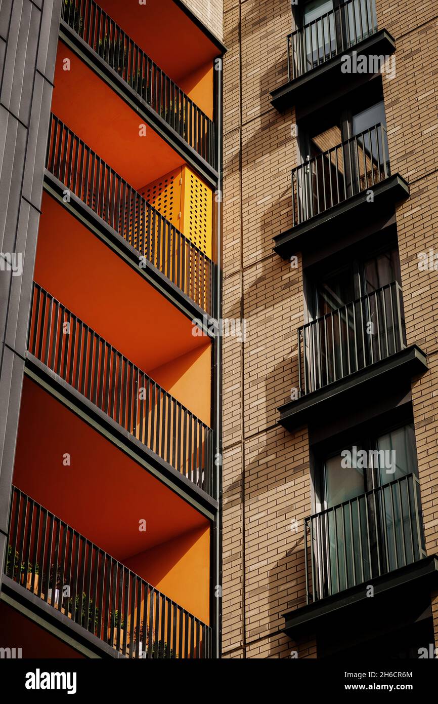 brick facade of new apartments. modern building with balconies Stock ...