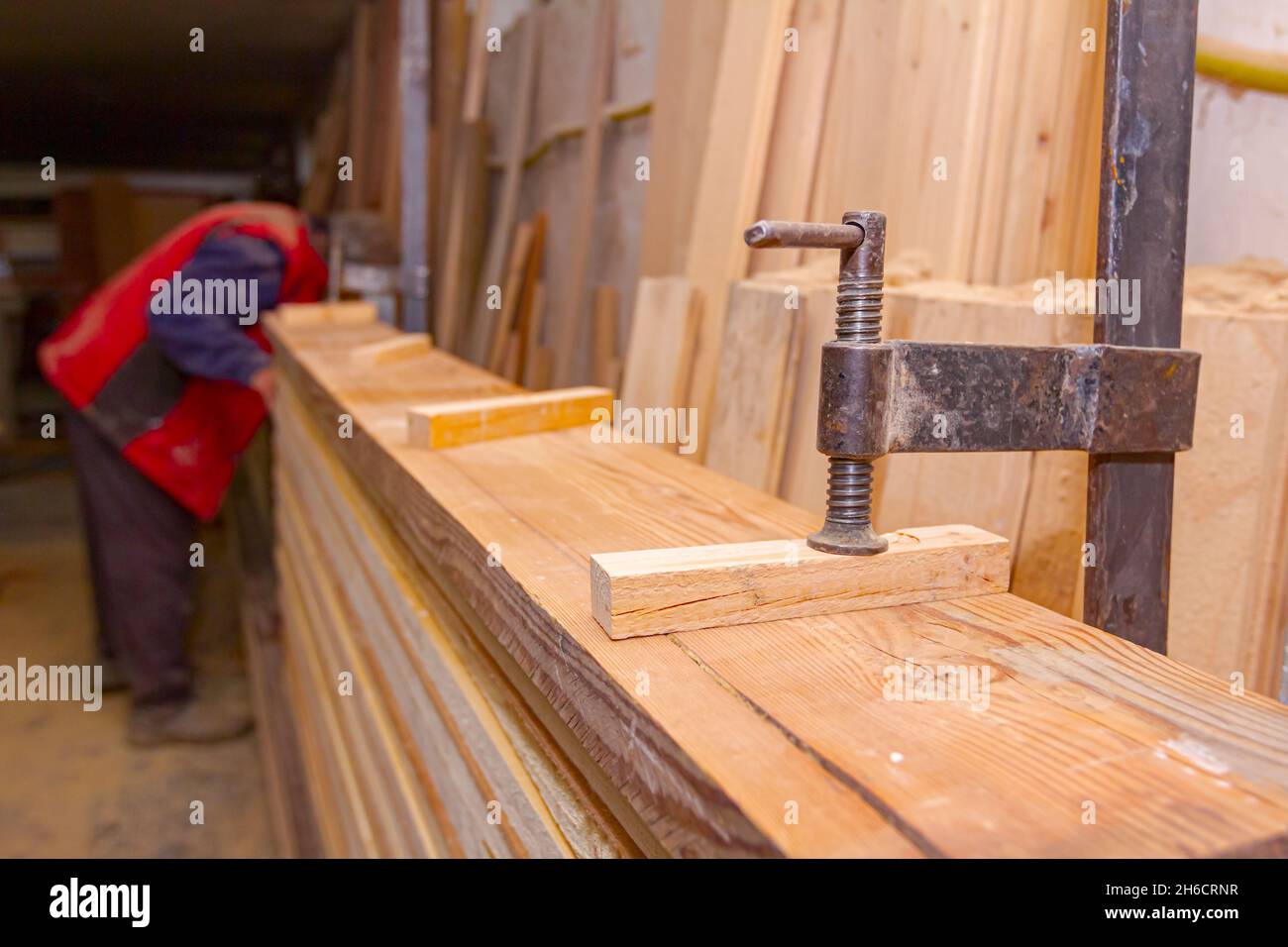 Process of drying glue in the manual production of wooden profiles in ...