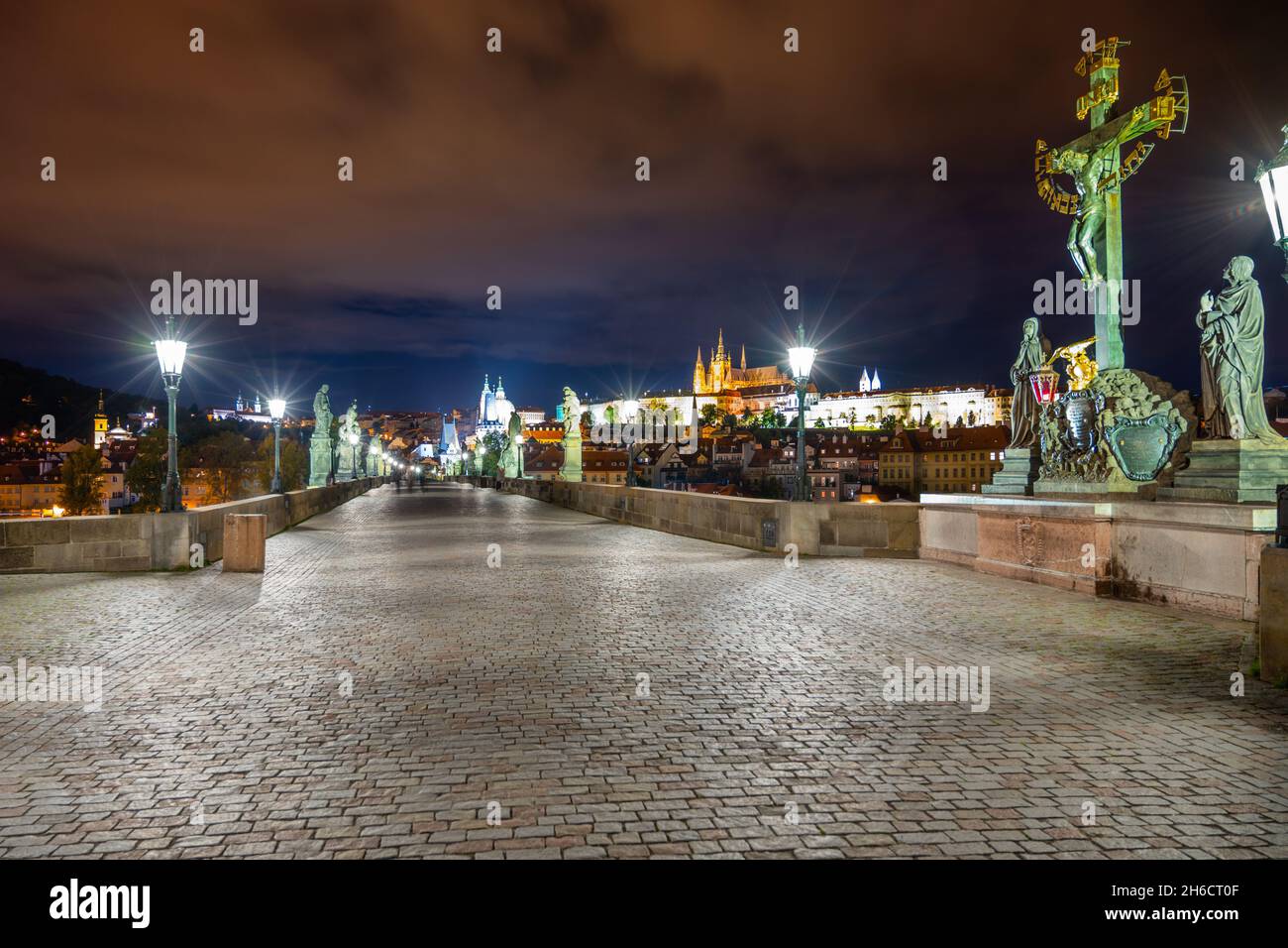 Illuminated Prague landmarks by night Stock Photo - Alamy