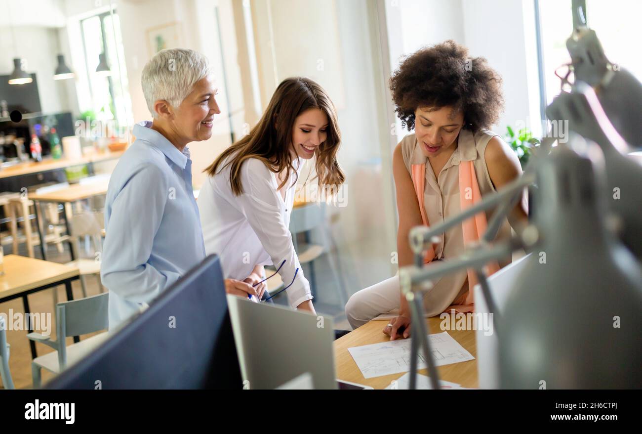 Group of happy multiethnic success business people working and ...