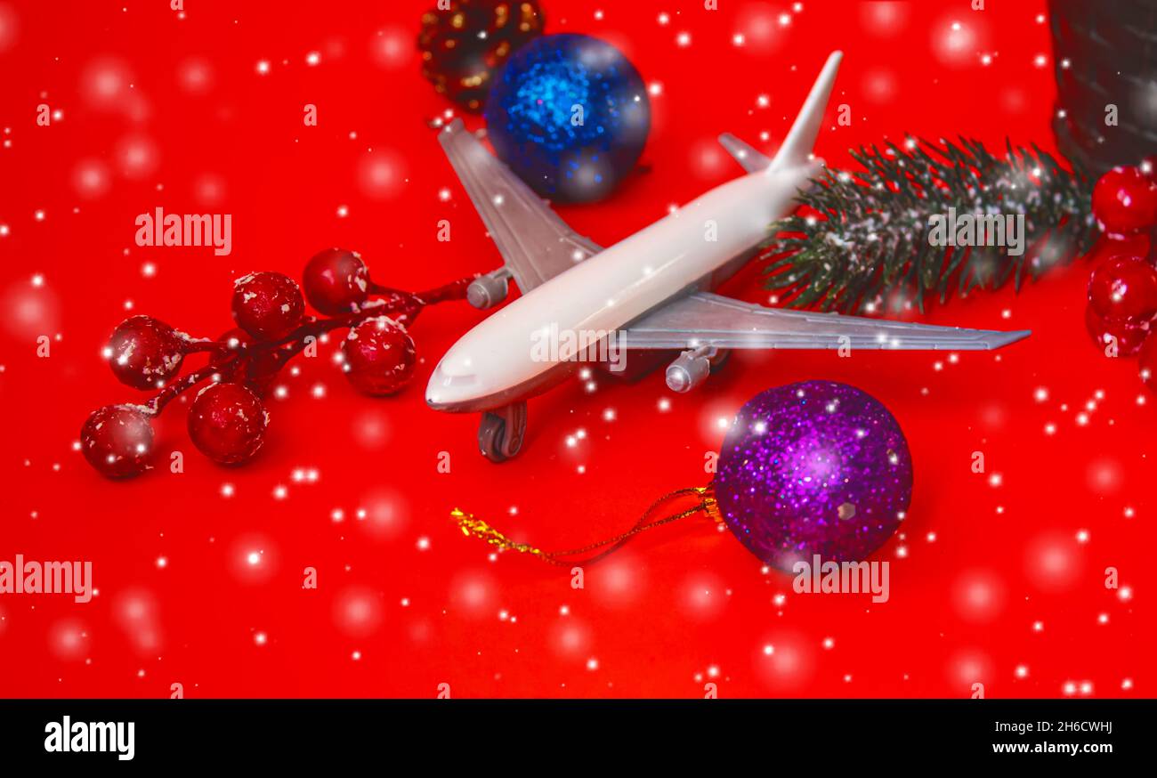 Travel for Christmas. Airplane with Christmas decor.New year.Selective ...